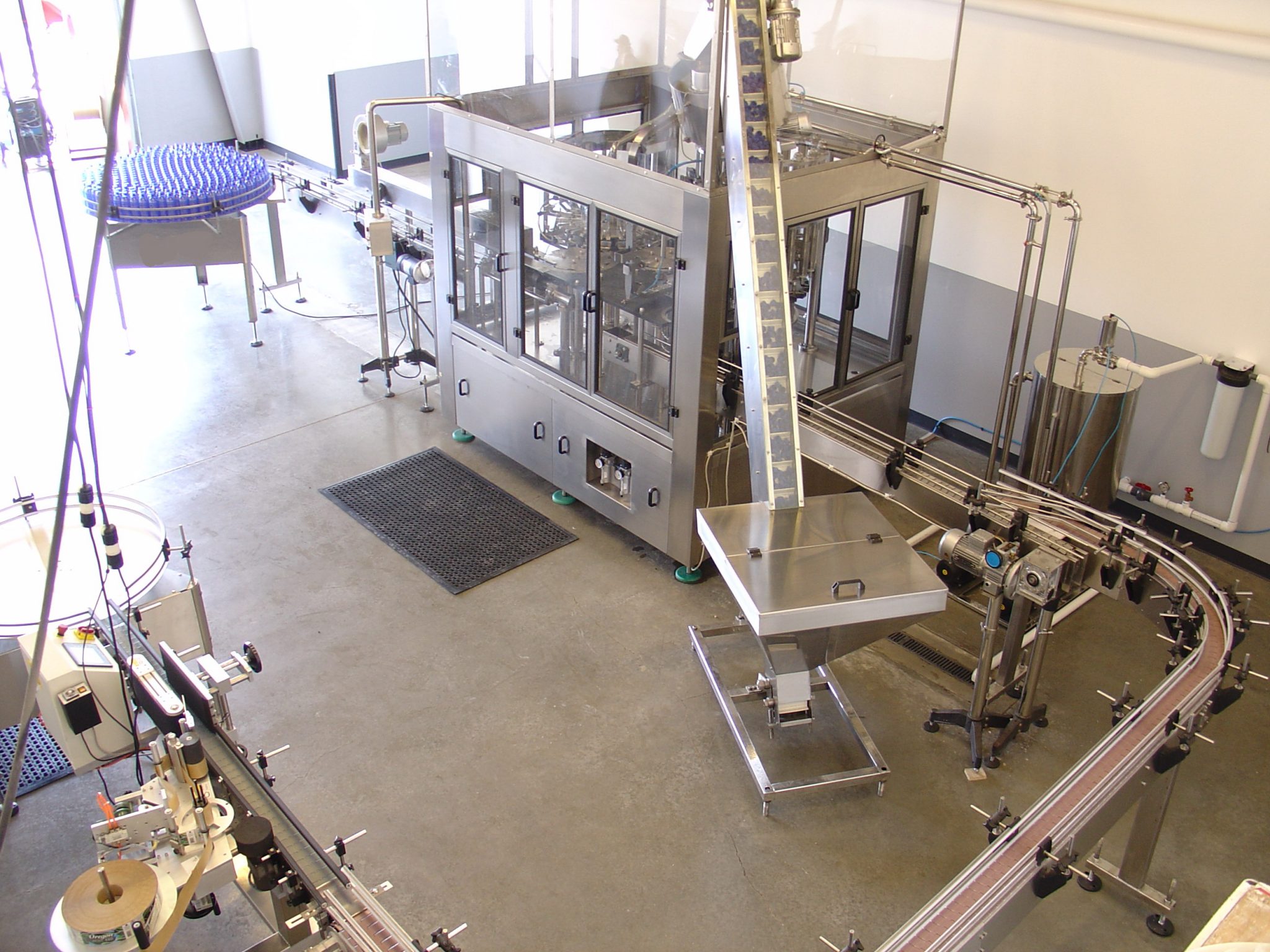 Rotary Rinser/Filler/Capper System - US Packaging Equipment